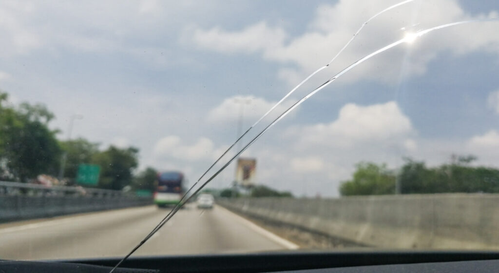How a Cracked Windshield Compromises Your Safety on the Road
